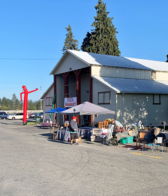 The Southern Oregon Flea Market welcomes treasure hunters with its unassuming exterior and that iconic red inflatable tube man dancing in the breeze. Treasure awaits!