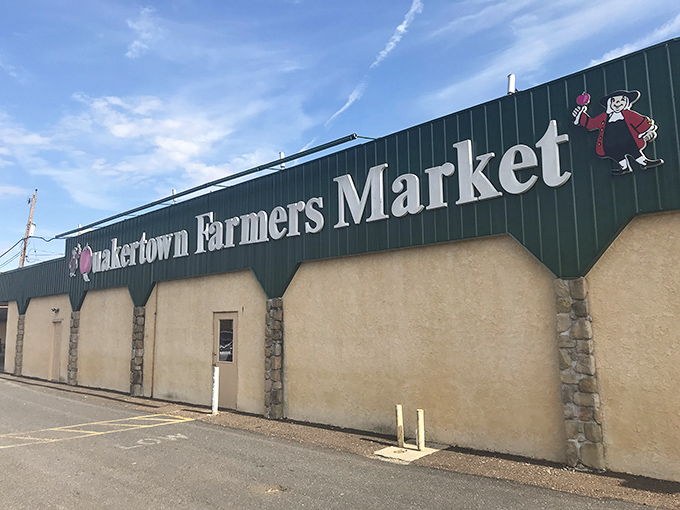 The iconic green signage welcomes bargain hunters and foodies alike. This unassuming exterior hides a wonderland of treasures waiting to be discovered.