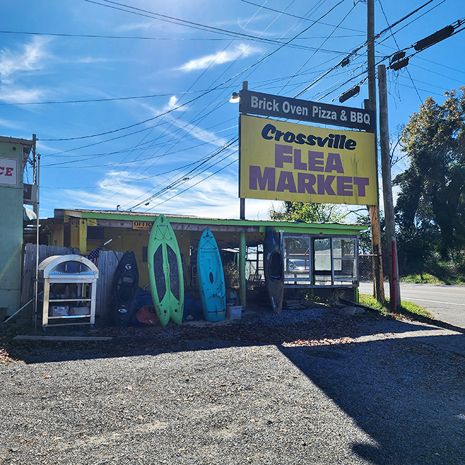 The iconic yellow sign welcomes treasure hunters to Crossville Flea Market, where kayaks stand ready for their next adventure&mdash;or your backyard.