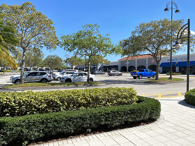 The grand entrance to Vero Beach Outlets welcomes shoppers with swaying palm trees and Mediterranean-inspired architecture &ndash; Florida's version of retail paradise.