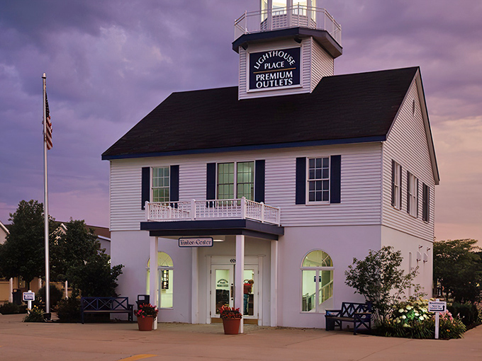 That lighthouse-topped information center looks like it sailed straight from a New England postcard into Indiana.