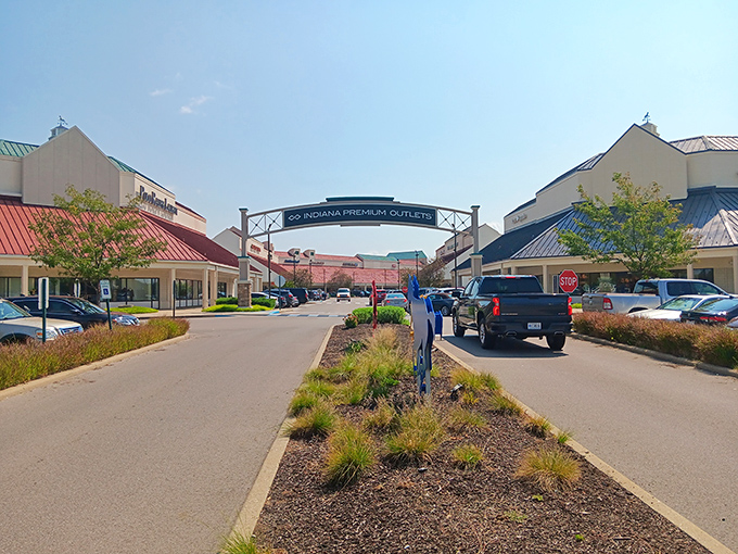 Welcome to bargain paradise! The iconic entrance to Indiana Premium Outlets stands ready to transform your shopping experience and rescue your budget from retail despair.