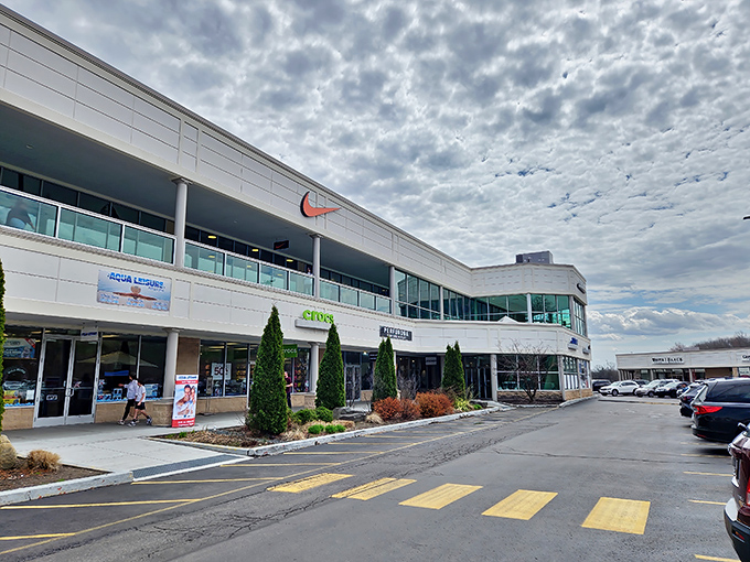 The gleaming white façade of Pocono Premium Outlets stands ready to welcome bargain hunters like a retail oasis in the Pocono Mountains.