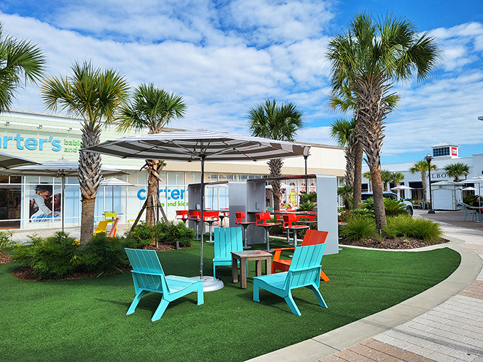 Those teal Adirondack chairs aren't just for show &ndash; they're strategic resting spots for when your shopping bags outweigh your arm strength.