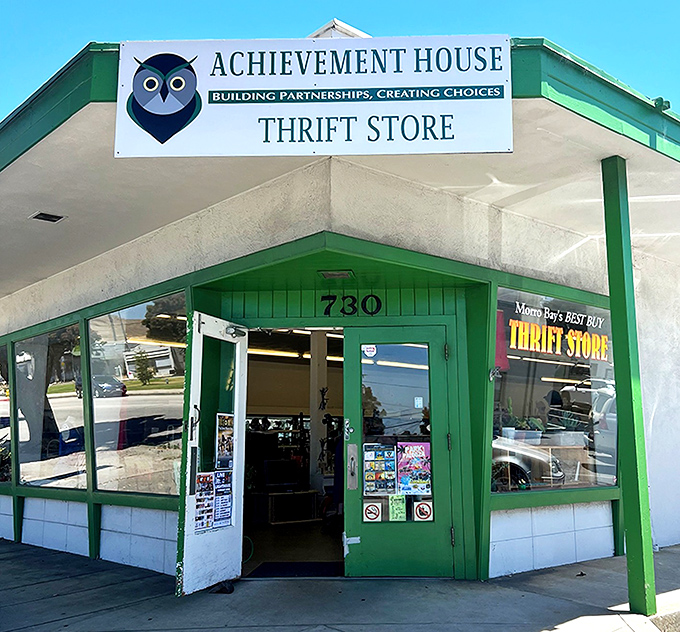 The iconic owl logo welcomes bargain hunters to Achievement House Thrift Store, where treasures and purpose come together under one cheerful green-trimmed roof.