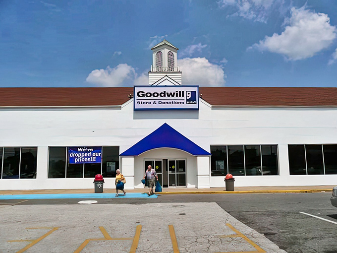 The blue-trimmed entrance beckons like a portal to possibility&mdash;where fashion finds and home treasures await under that distinctive Goodwill sign.