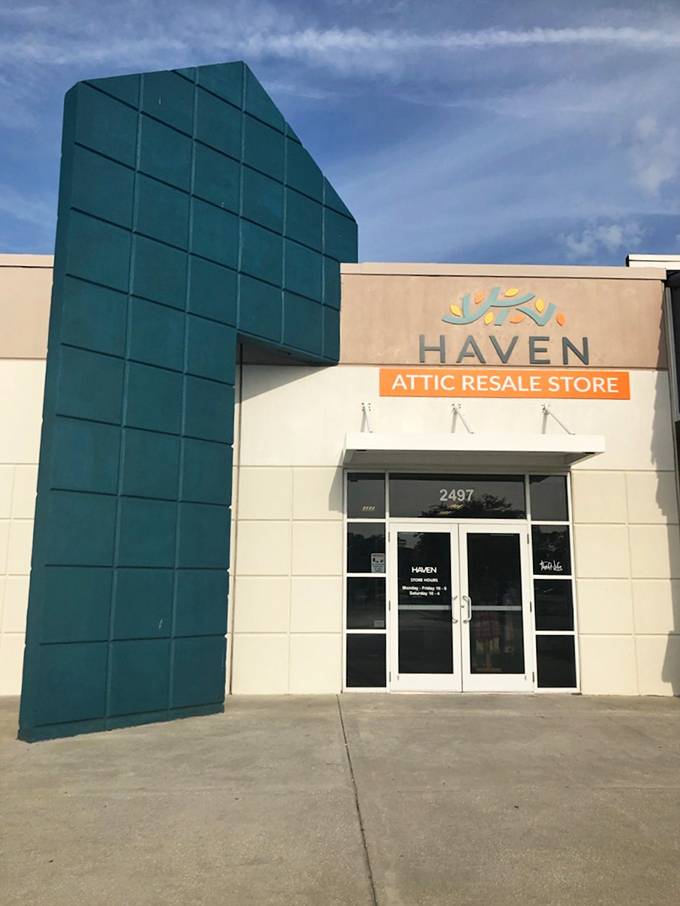 The teal architectural feature stands like a beacon of bargain hope against the Florida sky, guiding treasure hunters to their destination.