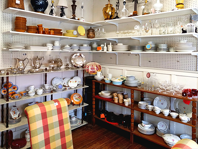 The charming cottage-style exterior of ReTails Thrift Shop beckons with its bright red roof and white picket fence&mdash;a treasure hunt disguised as a building.