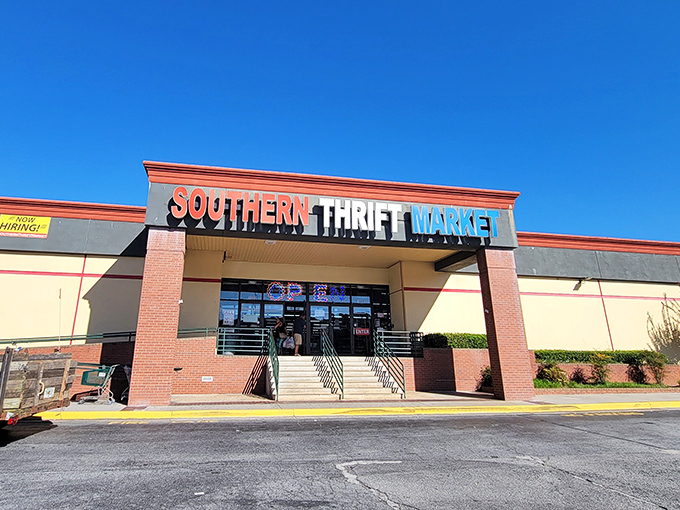 The red, white, and blue sign beckons like a patriotic promise of bargains within. This unassuming storefront holds treasures waiting to be discovered.