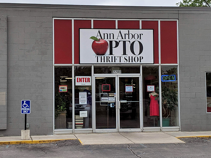 The unassuming gray exterior with its bright red-framed apple logo promises treasures within&mdash;like finding a diamond mine disguised as a garden shed.