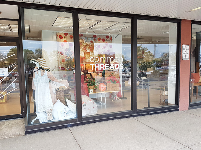 The unassuming storefront of Common Threads belies the treasure trove within. Like finding a secret portal to bargain paradise!