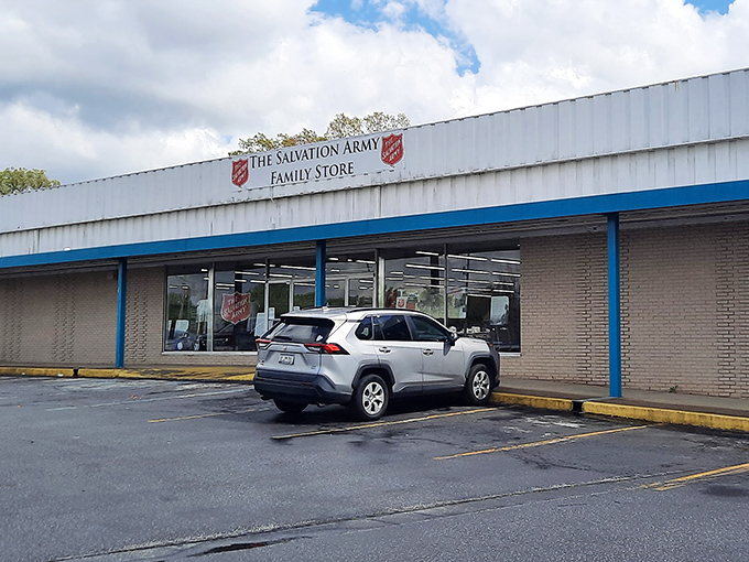 The iconic red shield beckons bargain hunters like a lighthouse for the thrifty. This unassuming exterior houses treasures waiting to be discovered.