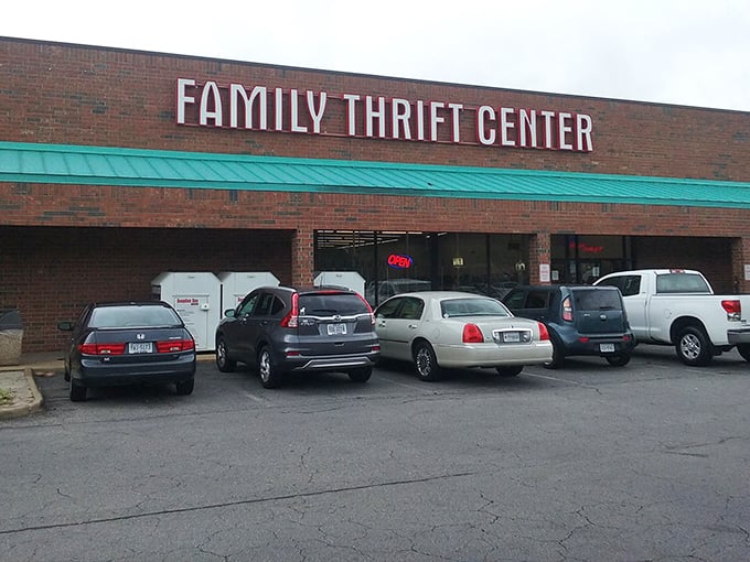 The gateway to thrifting paradise beckons with fluorescent promise. That "Open" sign might as well say "Abandon all budget restraint, ye who enter here." 