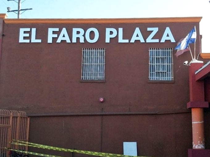 The terracotta-colored exterior of El Faro Plaza stands like a beacon for bargain hunters, its iconic lighthouse logo promising treasures within.