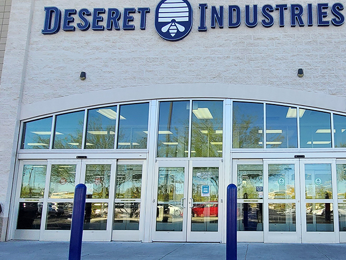 The gleaming facade of Deseret Industries in Glendale beckons like a siren song to bargain hunters. Treasure awaits behind those blue-trimmed doors!