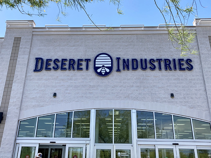 The gleaming facade of Deseret Industries in Glendale beckons like a siren song to bargain hunters. Treasure awaits behind those blue-trimmed doors!