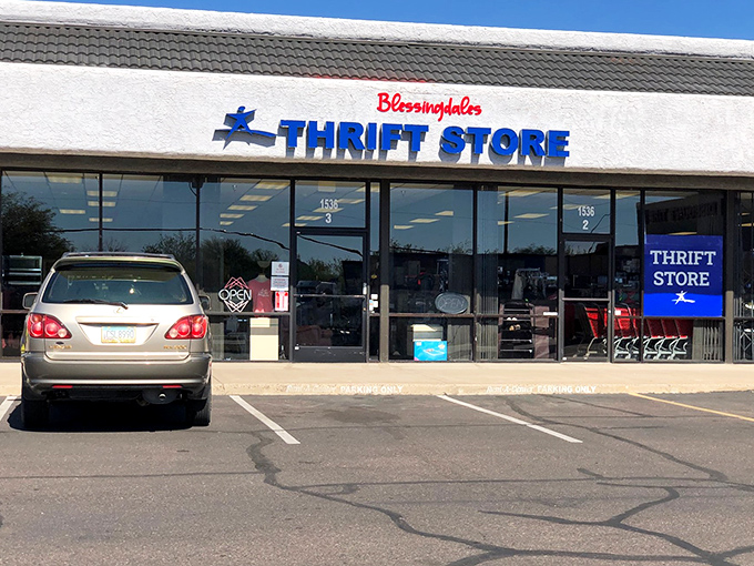 The blue and red signage of Blessingdales beckons bargain hunters like a retail oasis in the desert, complete with sidewalk specials on furniture.