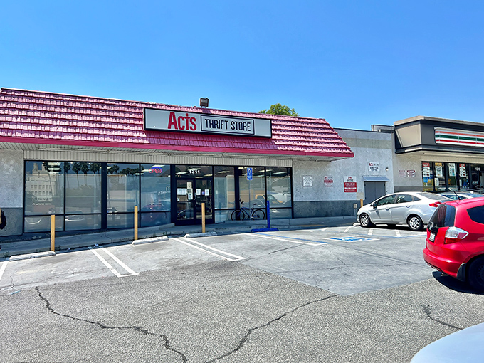 The iconic red roof of ACTS Thrift Store in Pasadena stands out like a beacon for bargain hunters seeking affordable treasures.