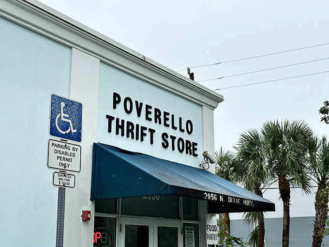 The unassuming storefront of Poverello Thrift Store belies the wonderland of treasures waiting inside. Florida's palm trees stand guard outside this bargain hunter's paradise.