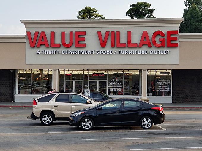 The iconic red signage of Value Village stands as a beacon for bargain hunters, promising treasures within its unassuming exterior.