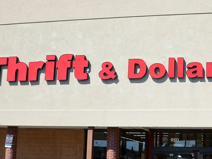 The iconic red signage of Thrift & Dollar Inc beckons bargain hunters like a lighthouse for the fiscally responsible in Aurora.