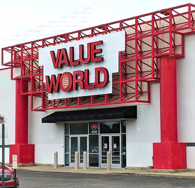 The iconic red-framed entrance of Value World stands like a portal to treasure hunting adventures. Michigan thrifters know this sign means serious bargain business.