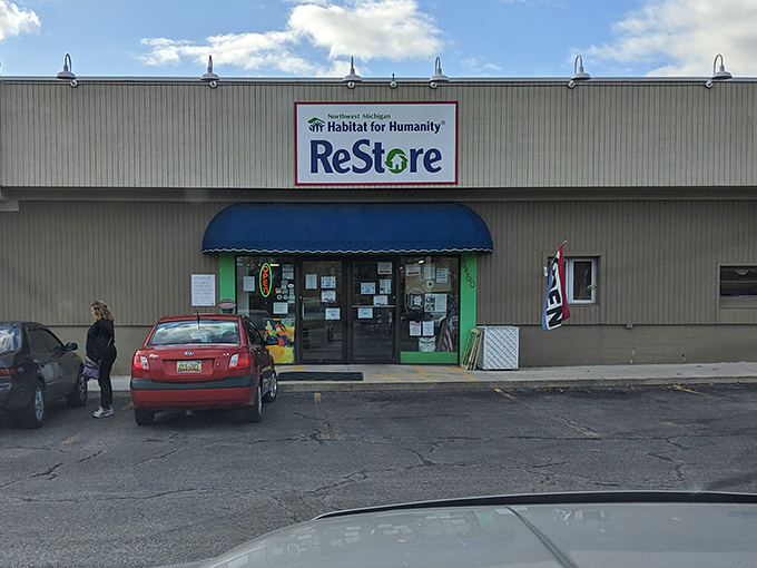 With its blue awning and green-trimmed entrance, this spot calls out to savvy shoppers like a thrifty siren song. Step inside&mdash;treasure awaits!