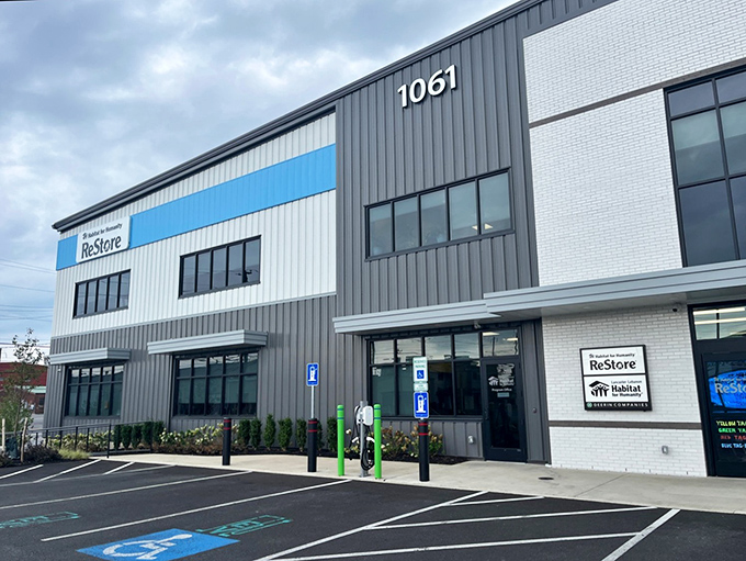 The blue and green sign welcomes bargain hunters to Lancaster's ReStore, where one person's donations become another's affordable treasures.