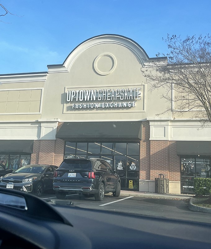 The distinctive arched facade of Uptown Cheapskate stands like a fashion oasis in Virginia Beach, promising treasure hunts where your wallet won't need therapy afterward.