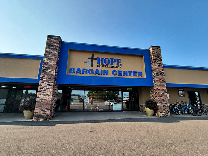 The blue facade of Hope Bargain Center stands like a retail oasis in Eau Claire, promising treasures within that won't empty your wallet.