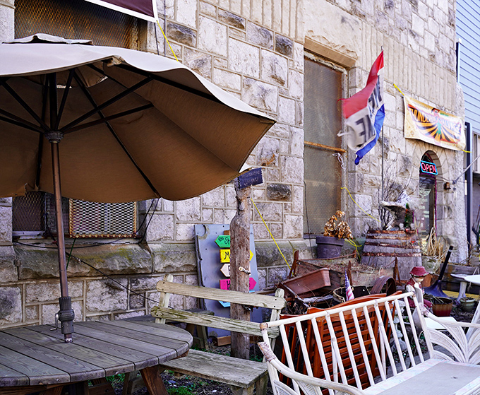 The outdoor patio at Thunderbird Salvage feels like your eccentric aunt's backyard—where mismatched furniture somehow creates the perfect spot for contemplating your finds.