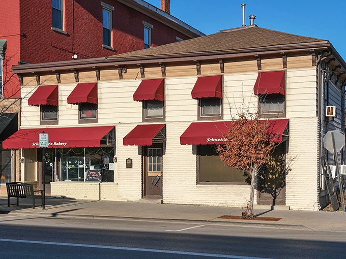The cream-colored building with cherry-red awnings stands like a sweet beacon in Westerville's historic district, promising delicious treasures within.