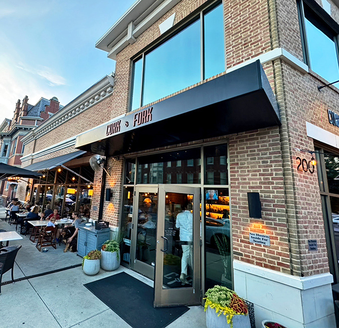 The brick fa&ccedil;ade of Cork & Fork stands proudly on a Harrisburg corner, promising culinary adventures within those welcoming glass doors.