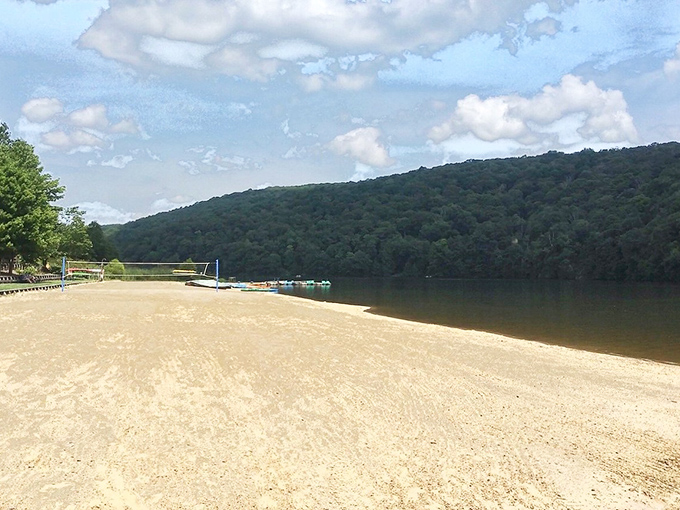 Golden sands stretch toward forested hills, creating that rare Pennsylvania beach where you can build sandcastles without needing a passport or ocean salt.