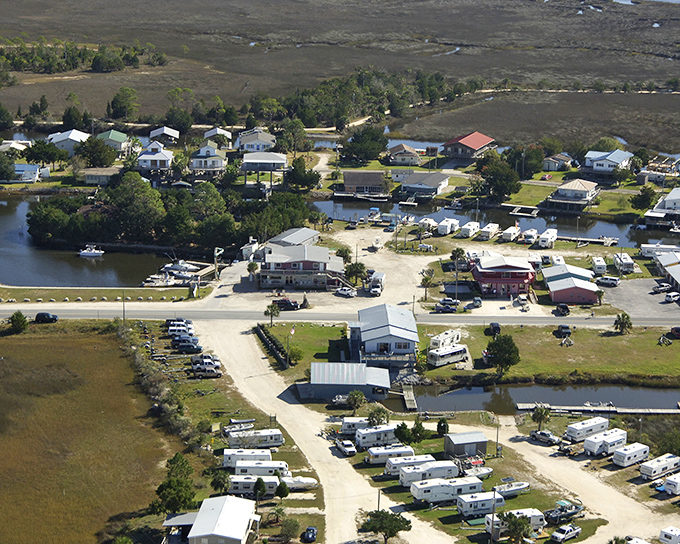 Aerial paradise where waterways weave between homes like nature's own Venice, minus the gondolas and with considerably more fishing rods.
