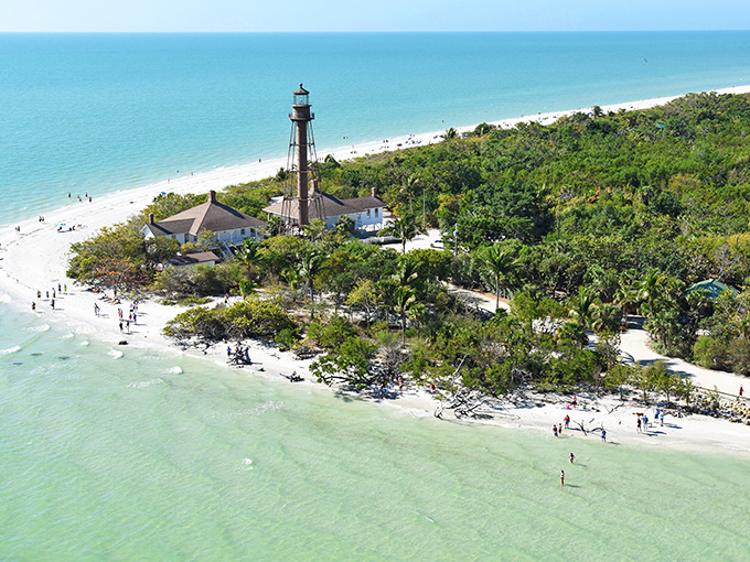 The iconic Sanibel Lighthouse stands sentinel over waters so turquoise they look Photoshopped. Mother Nature showing off her best work without a filter.