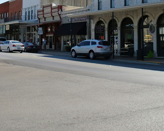Granbury's historic downtown storefronts transport you to a simpler time, where modern SUVs park alongside architecture that's witnessed a century of Texas tales.