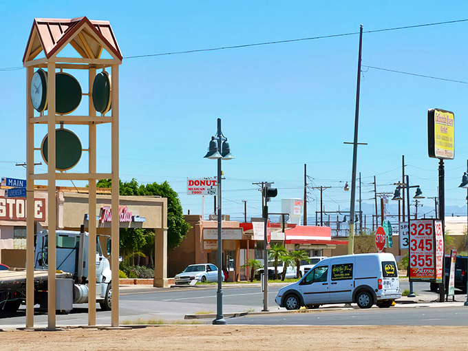Downtown Calipatria showcases its modest charm with a bell tower structure standing sentinel over sun-baked streets where life moves at its own unhurried desert pace.