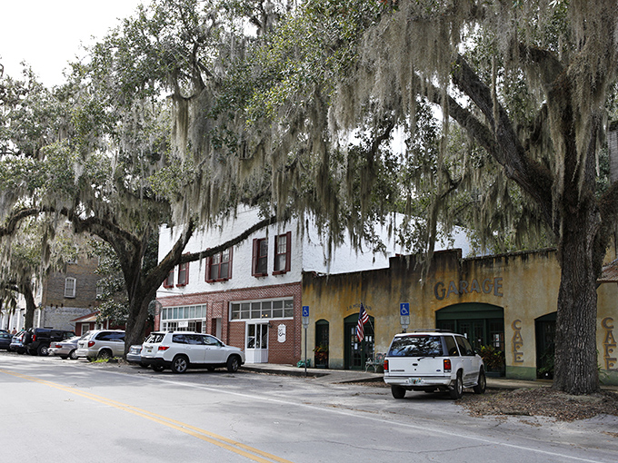 Spanish moss drapes over Micanopy's historic buildings like nature's own decorating committee decided this town deserved extra charm.