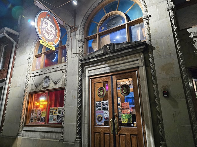 That grinning jester sign isn't kidding around &ndash; behind these historic wooden doors awaits pizza perfection that locals have treasured for years.