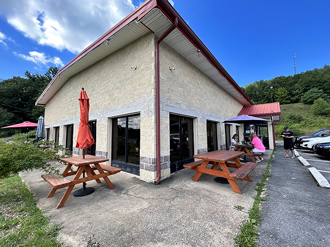 Nestled against Pennsylvania's rolling hills, Kavkaz's distinctive red-roofed building promises culinary adventures far beyond its unassuming exterior.