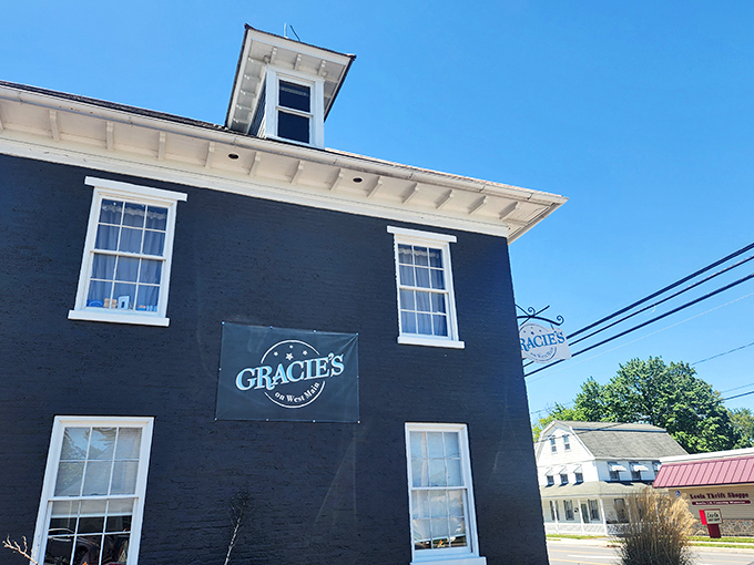 The striking black exterior of Gracie's stands out like a culinary beacon in Leola, promising comfort food adventures within those white-trimmed windows.