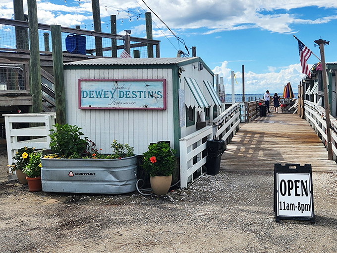 The entrance to paradise isn't pearly gates, but a weathered wooden boardwalk leading to Dewey Destin's&mdash;where seafood dreams come true and calories don't count.