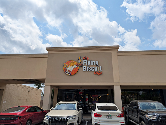 The unassuming strip mall exterior of Flying Biscuit Cafe proves once again that culinary treasures often hide in plain sight.