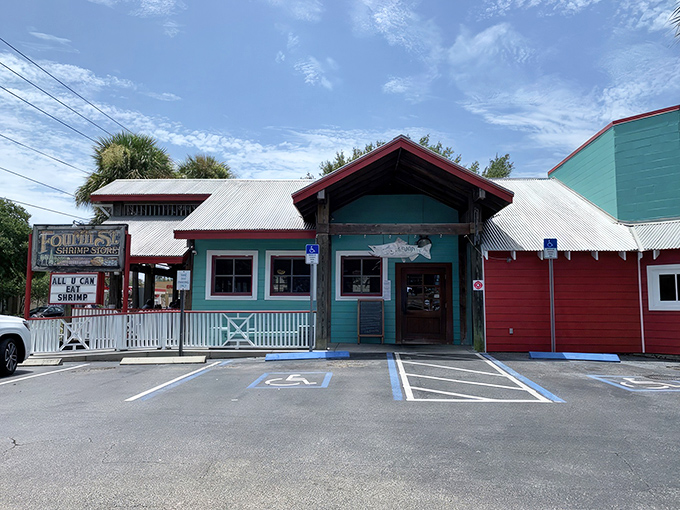That cheerful green and red exterior might look humble, but it's hiding some serious seafood magic inside.