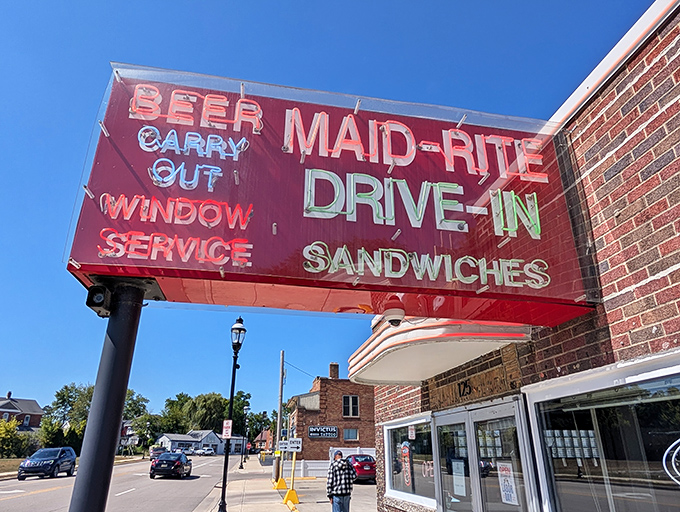 The iconic red Maid-Rite sign stands as a time-tested beacon of comfort food in Greenville, promising simple pleasures and thick milkshakes.