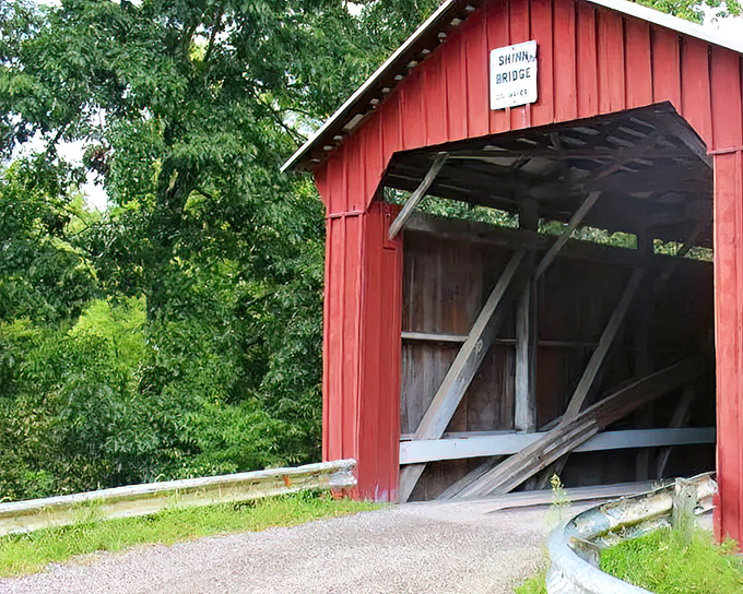 Like a portal to simpler days, the Shinn Bridge sign welcomes visitors with a promise of rustic charm and historical whispers.