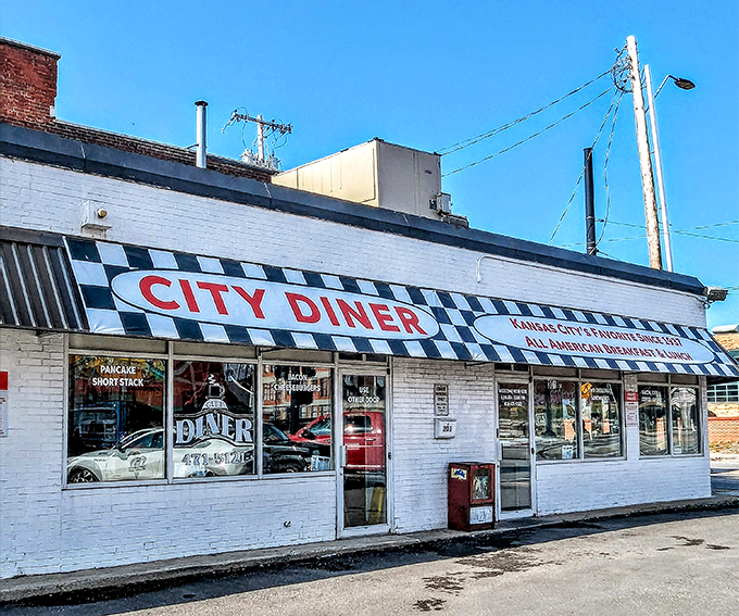 The classic black-and-white checkered awning isn't just decoration&mdash;it's a beacon of breakfast hope for hungry Kansas Citians seeking their morning salvation.