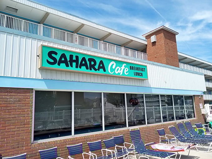 The green sign beckons like a breakfast lighthouse on Baltimore Avenue. Sahara Cafe's unassuming exterior hides Ocean City's morning treasure.
