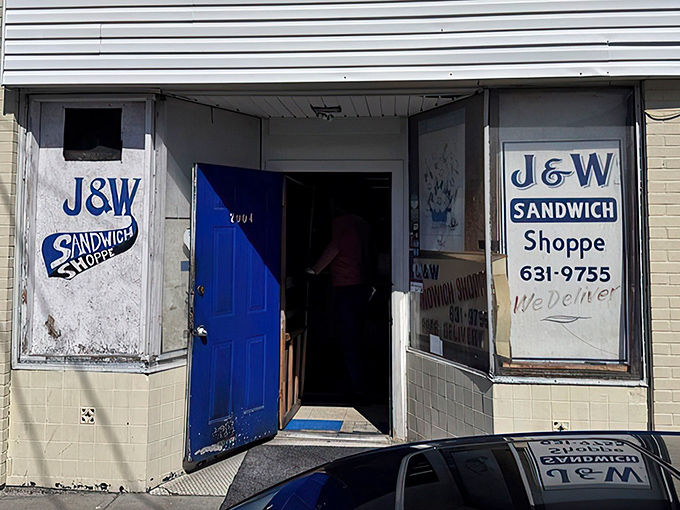 That blue door isn't just an entrance&mdash;it's a portal to sandwich nirvana. No fancy signage needed when what's inside speaks volumes.